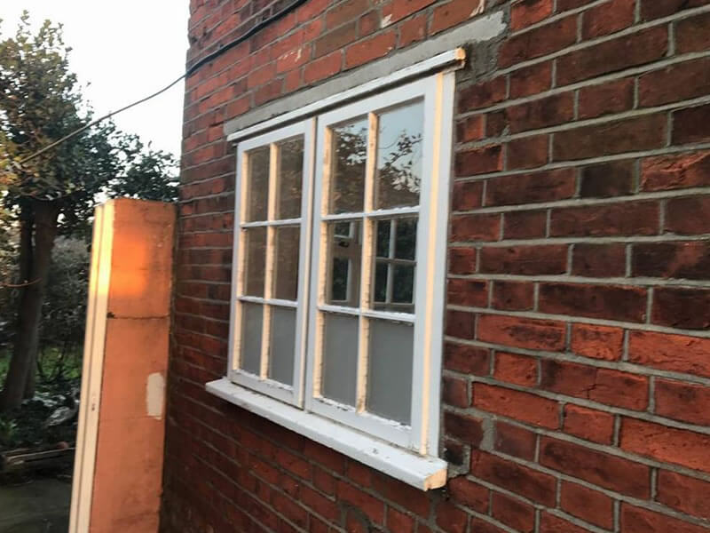 Old 70's timber frames upgraded to Anthracite grey on white upvc frames ...